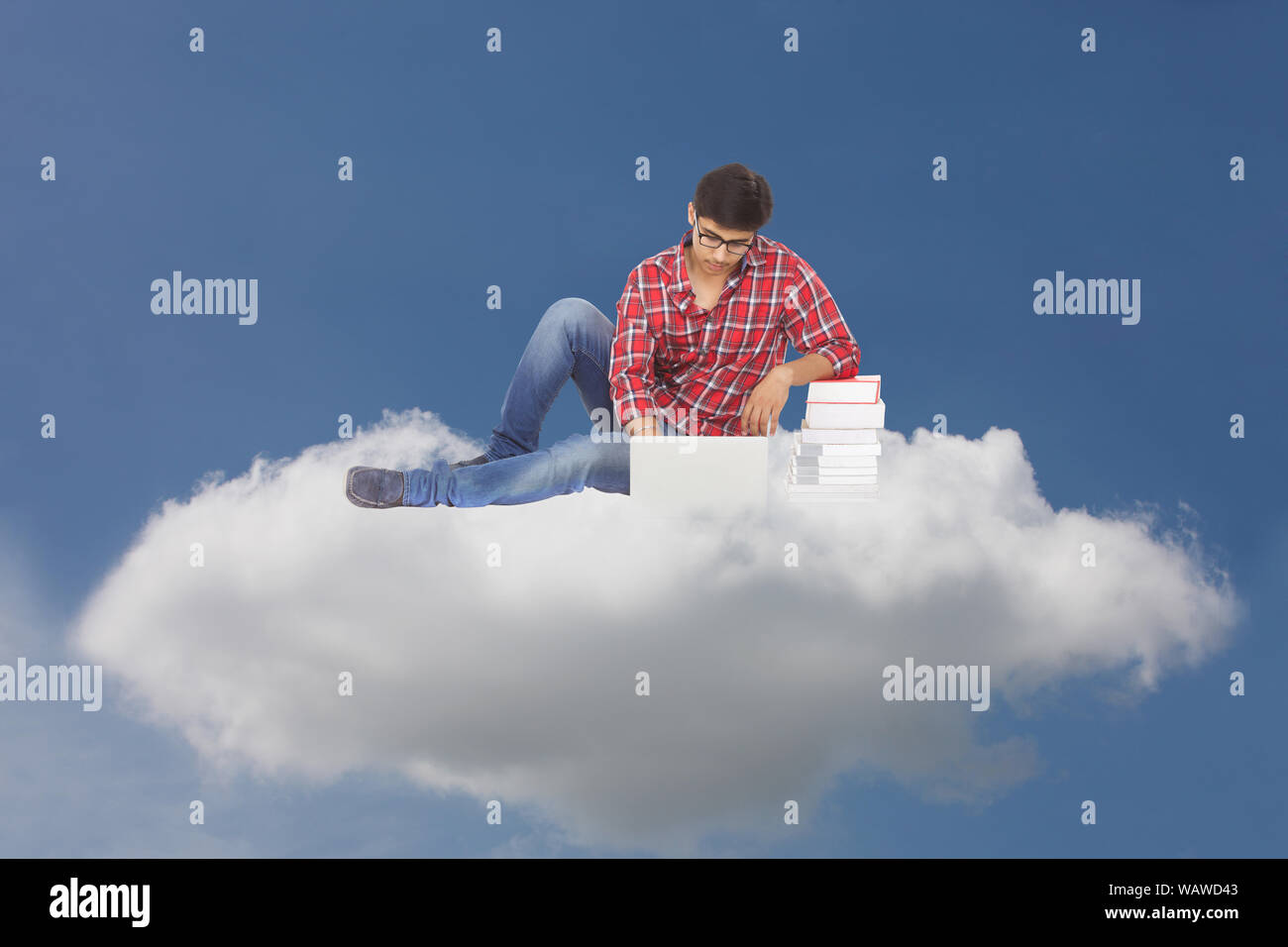 College student sitting on clouds and using a laptop concept cloud ...
