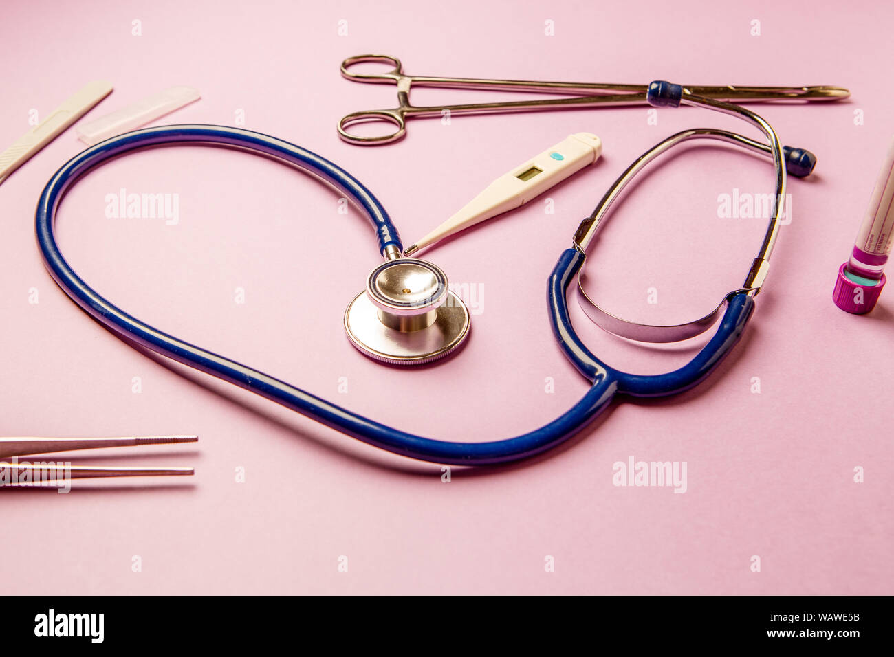 Doctor tools on blue surface. Medical concept Stock Photo - Alamy