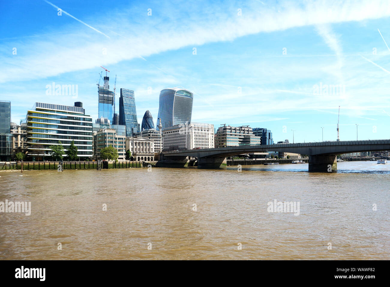 Panorama of London under the blue sky white white clouds and river ...