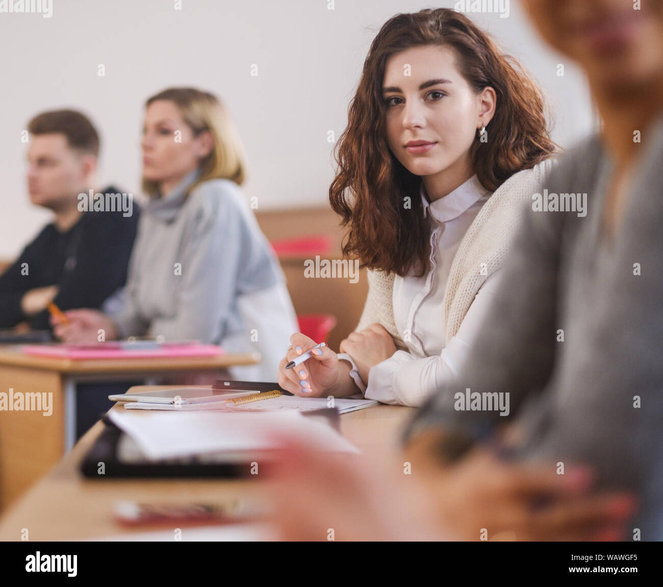 Multicultural group of students in an auditorium Stock Photo - Alamy