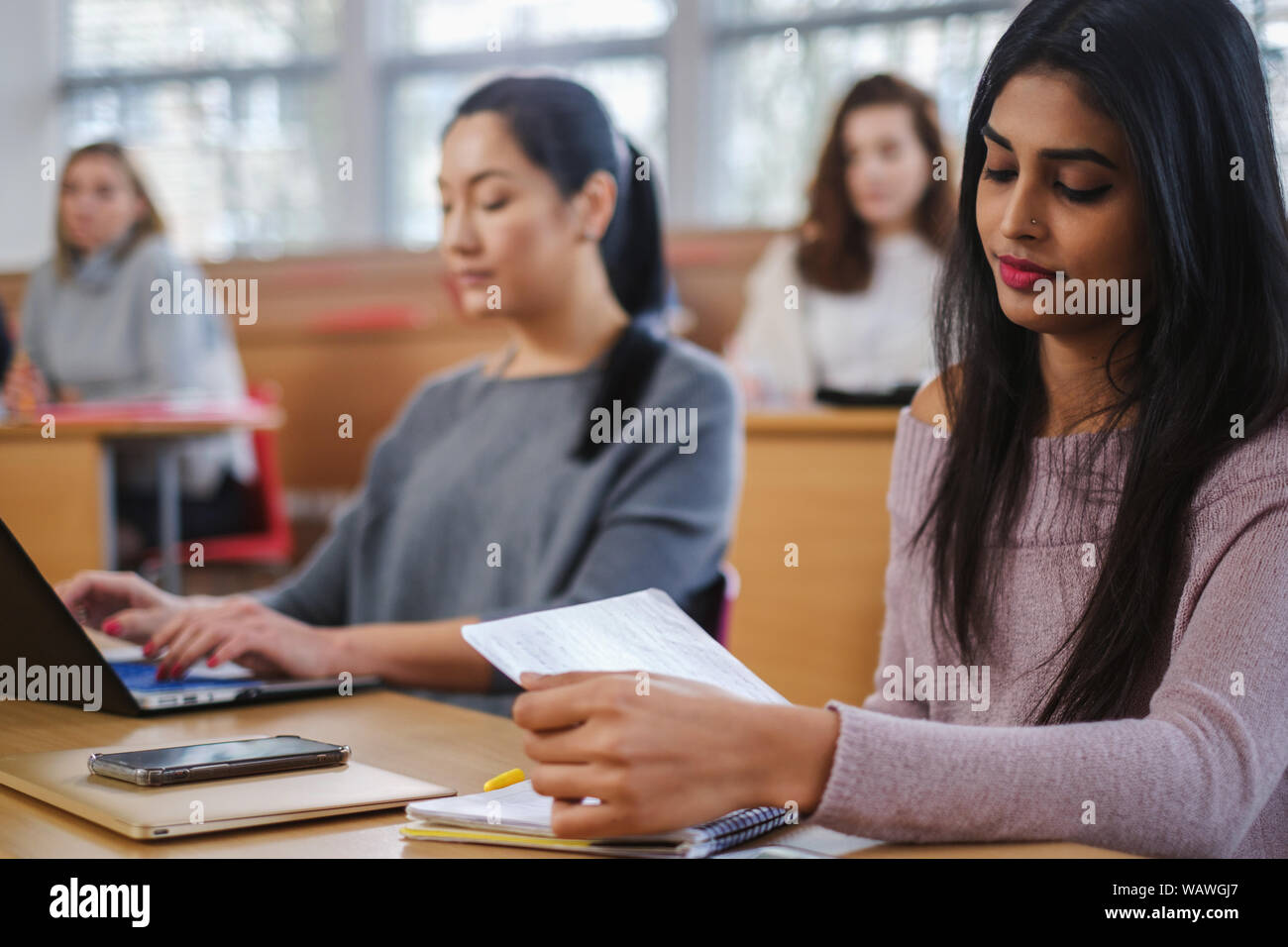 Multicultural group of students in an auditorium Stock Photo - Alamy