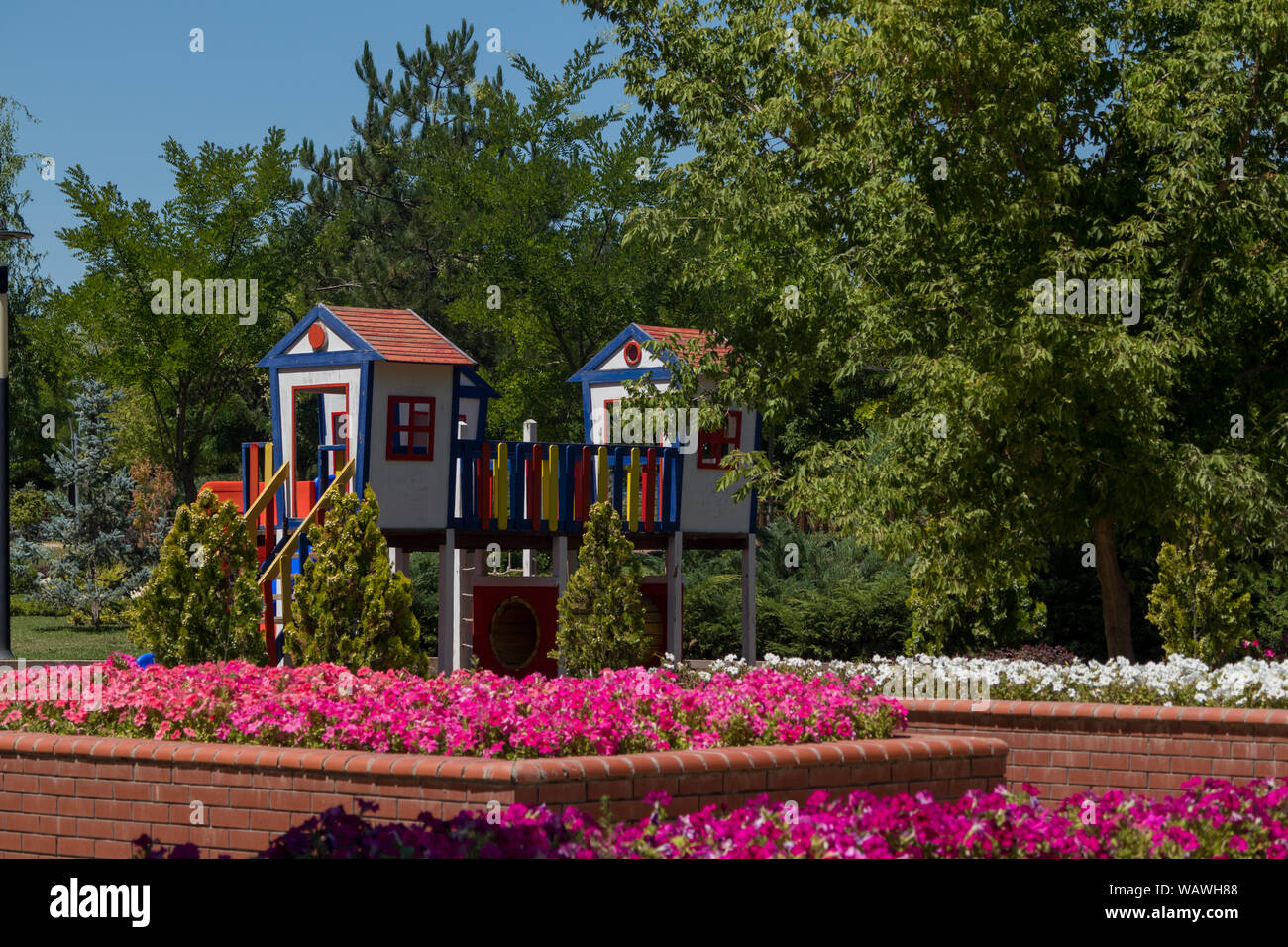 beautiful park and multi-colored children play park Stock Photo - Alamy