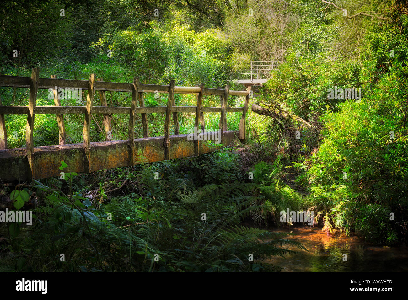 Rustic wooden bridge hi-res stock photography and images - Alamy