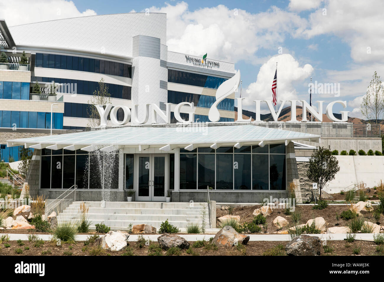 A logo sign outside of the headquarters of Young Living in Lehi, Utah on July 27, 2019 Stock ...