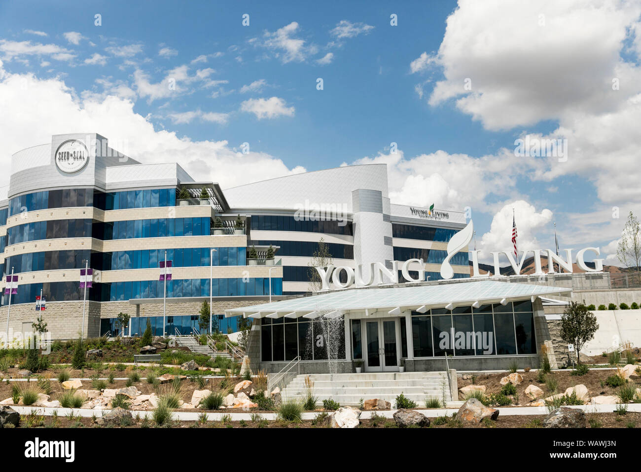 A logo sign outside of the headquarters of Young Living in Lehi, Utah on July 27, 2019 Stock ...