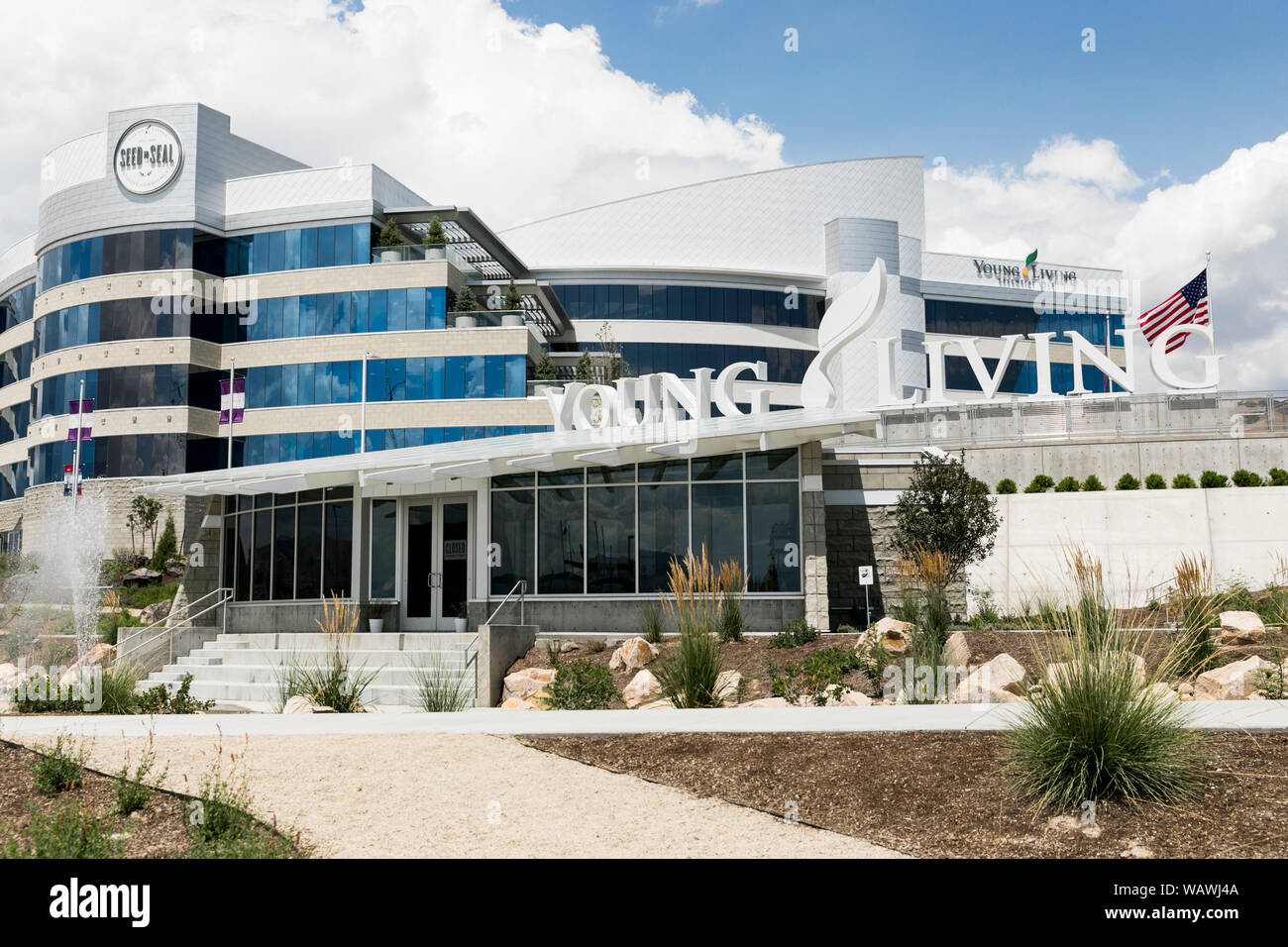 A logo sign outside of the headquarters of Young Living in Lehi, Utah on July 27, 2019 Stock ...
