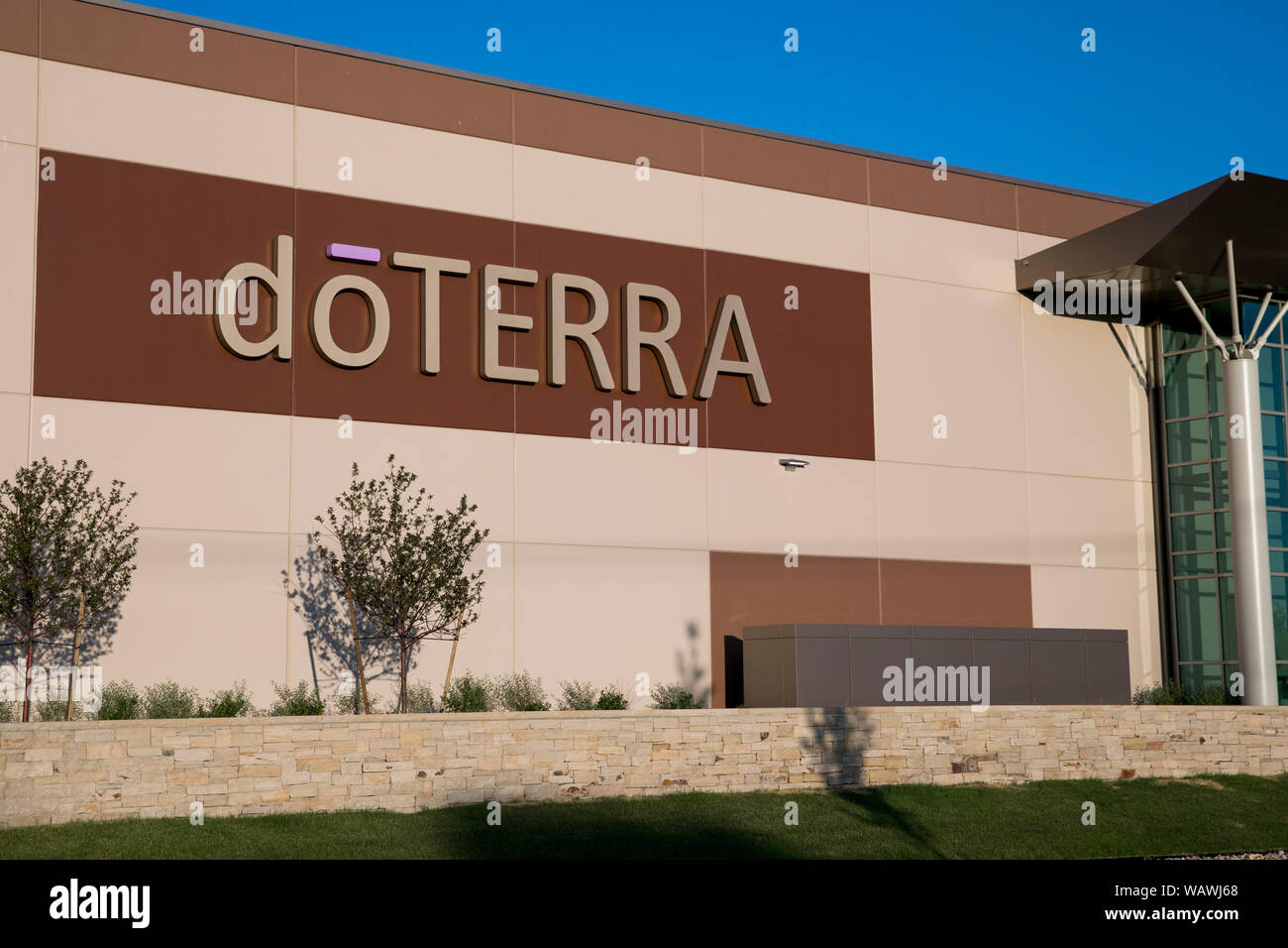 A logo sign outside of the headquarters of doTerra in Pleasant Grove ...