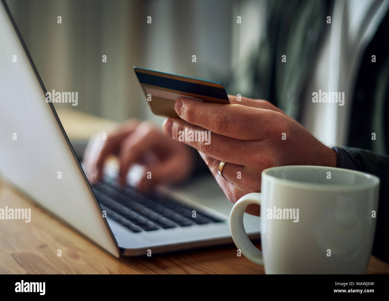 Pay online man hand hi-res stock photography and images - Alamy