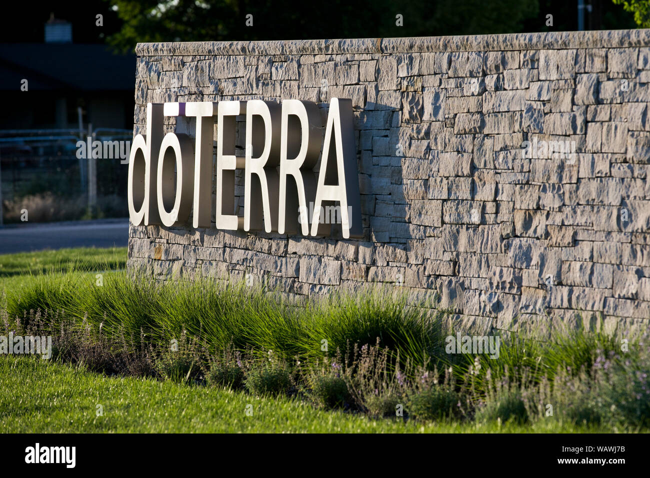 A logo sign outside of the headquarters of doTerra in Pleasant Grove ...