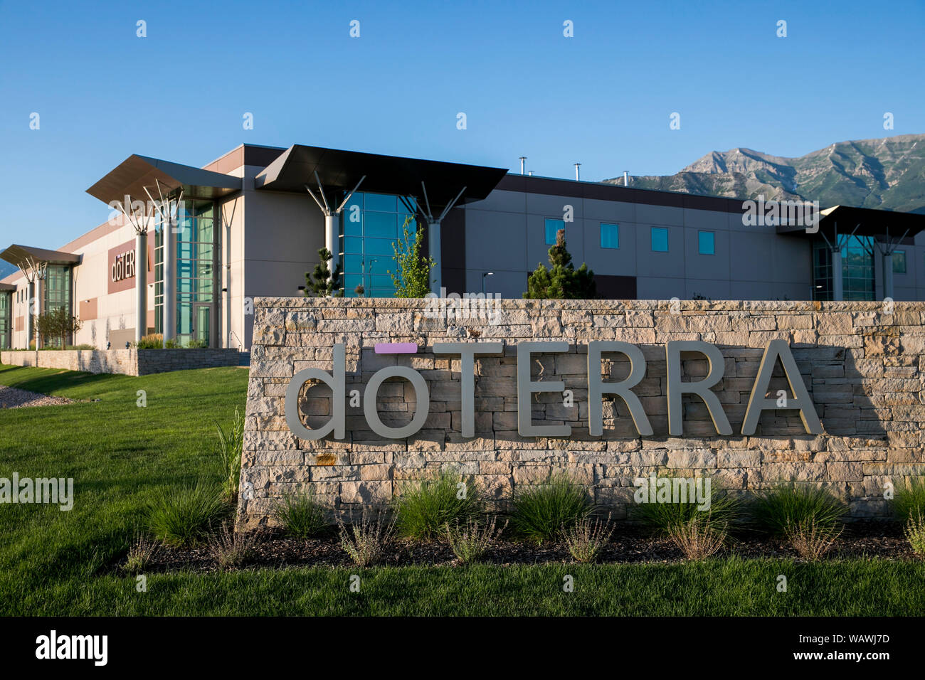 A logo sign outside of the headquarters of doTerra in Pleasant Grove ...