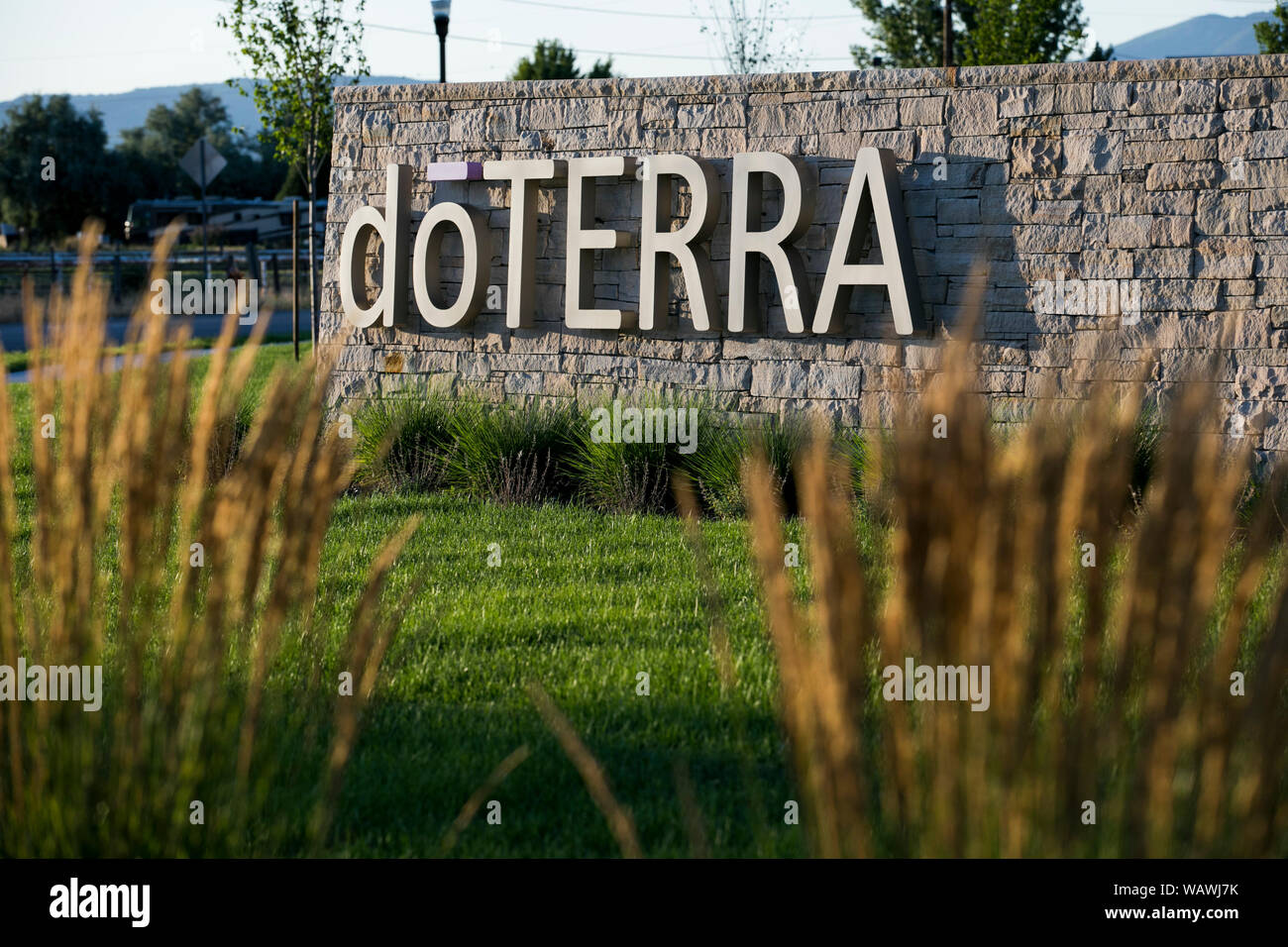 A logo sign outside of the headquarters of doTerra in Pleasant Grove ...