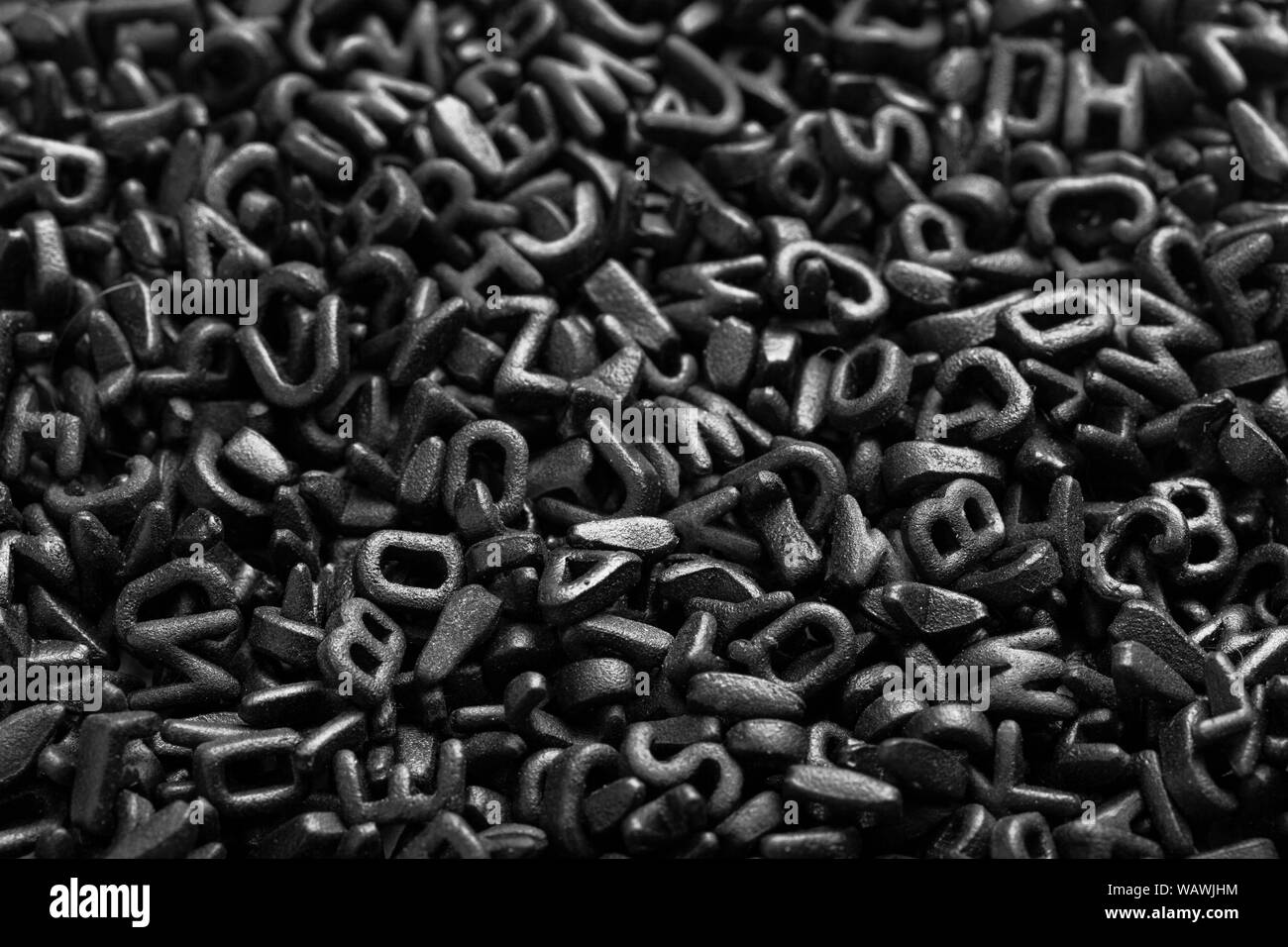 Texture with black letters. Scattered Alphabet Stock Photo - Alamy