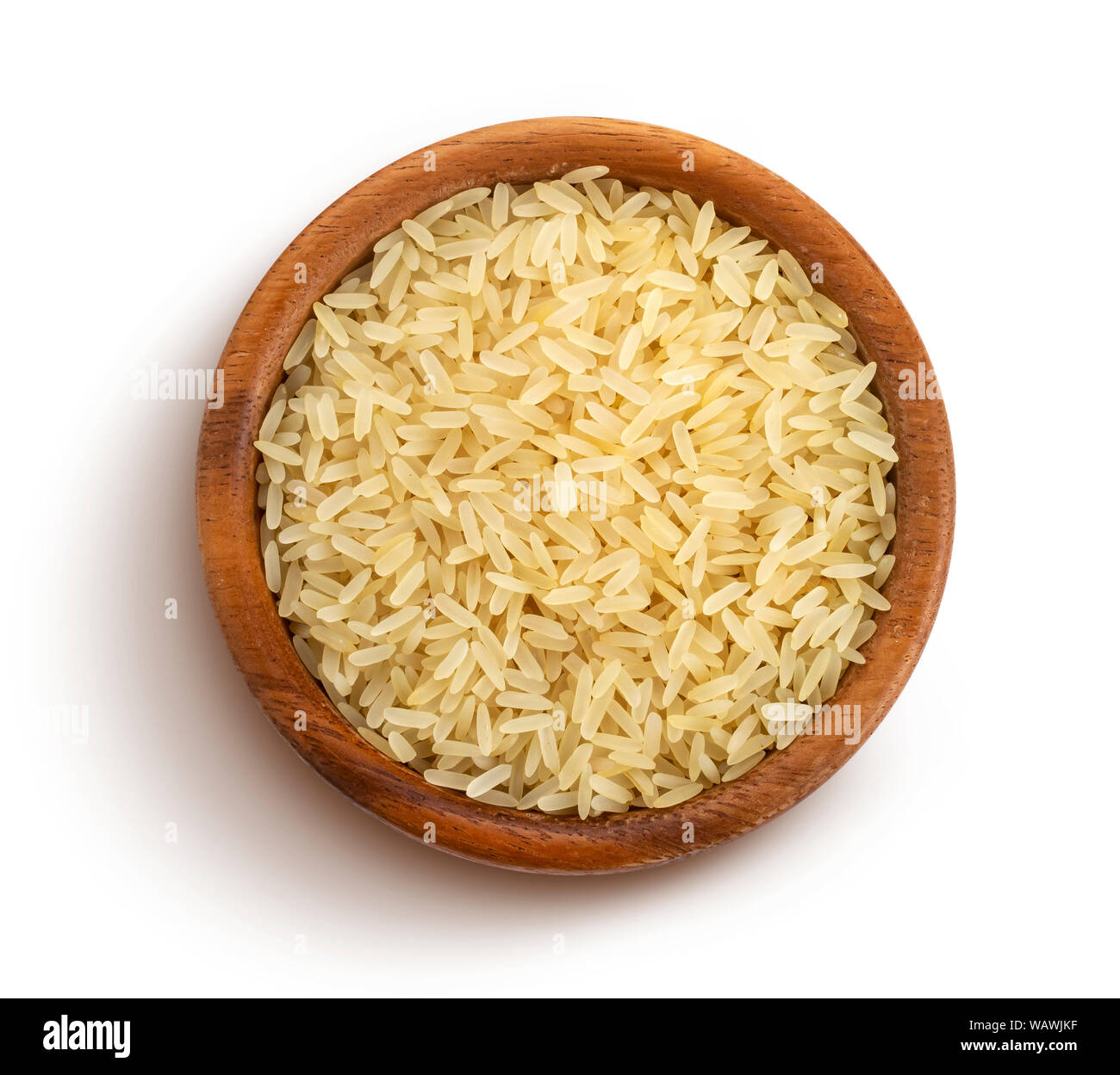 Parboiled rice groats isolated on white background, top view Stock ...