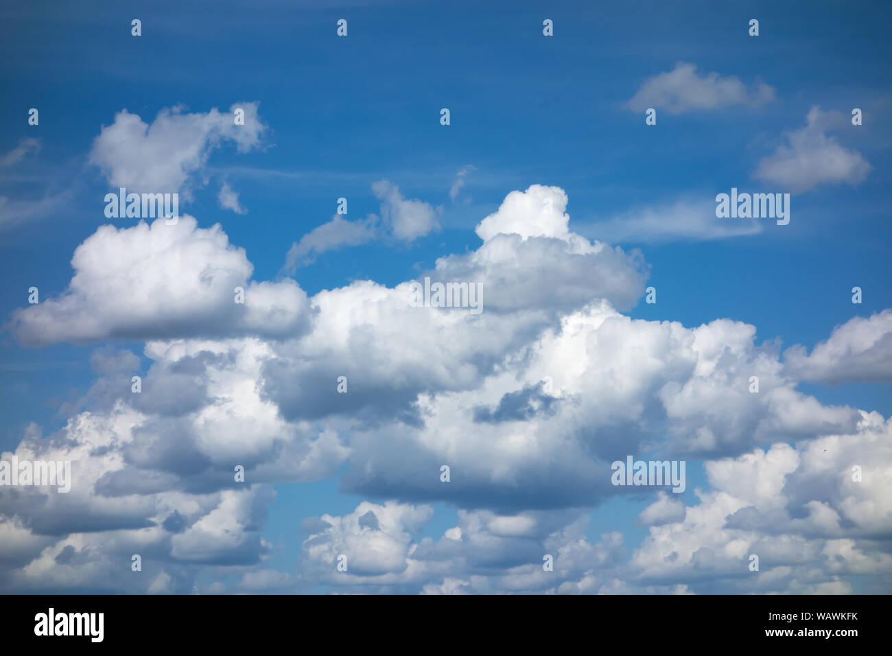 blue sky with flying white light clouds Stock Photo - Alamy