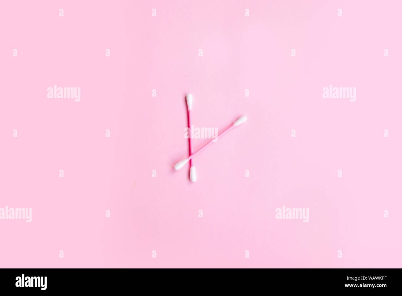 Composition of plastic wool swabs in the background. Flat lay. Copy ...