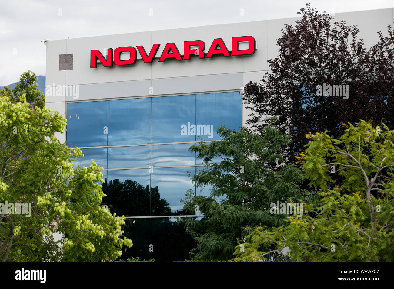 A logo sign outside of the headquarters of Novarad in American Fork ...