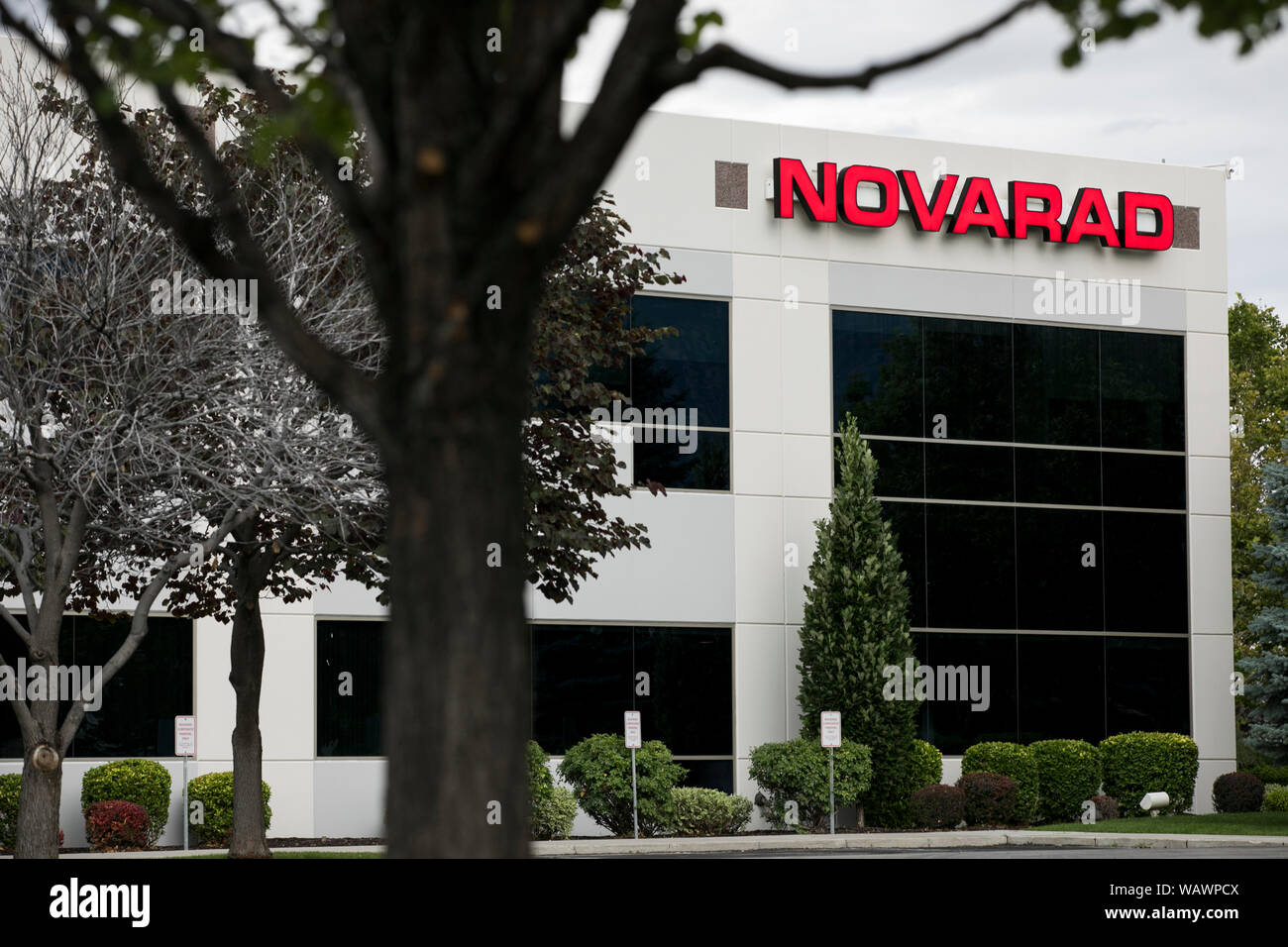 A logo sign outside of the headquarters of Novarad in American Fork ...