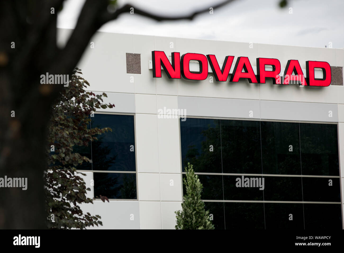 A logo sign outside of the headquarters of Novarad in American Fork ...