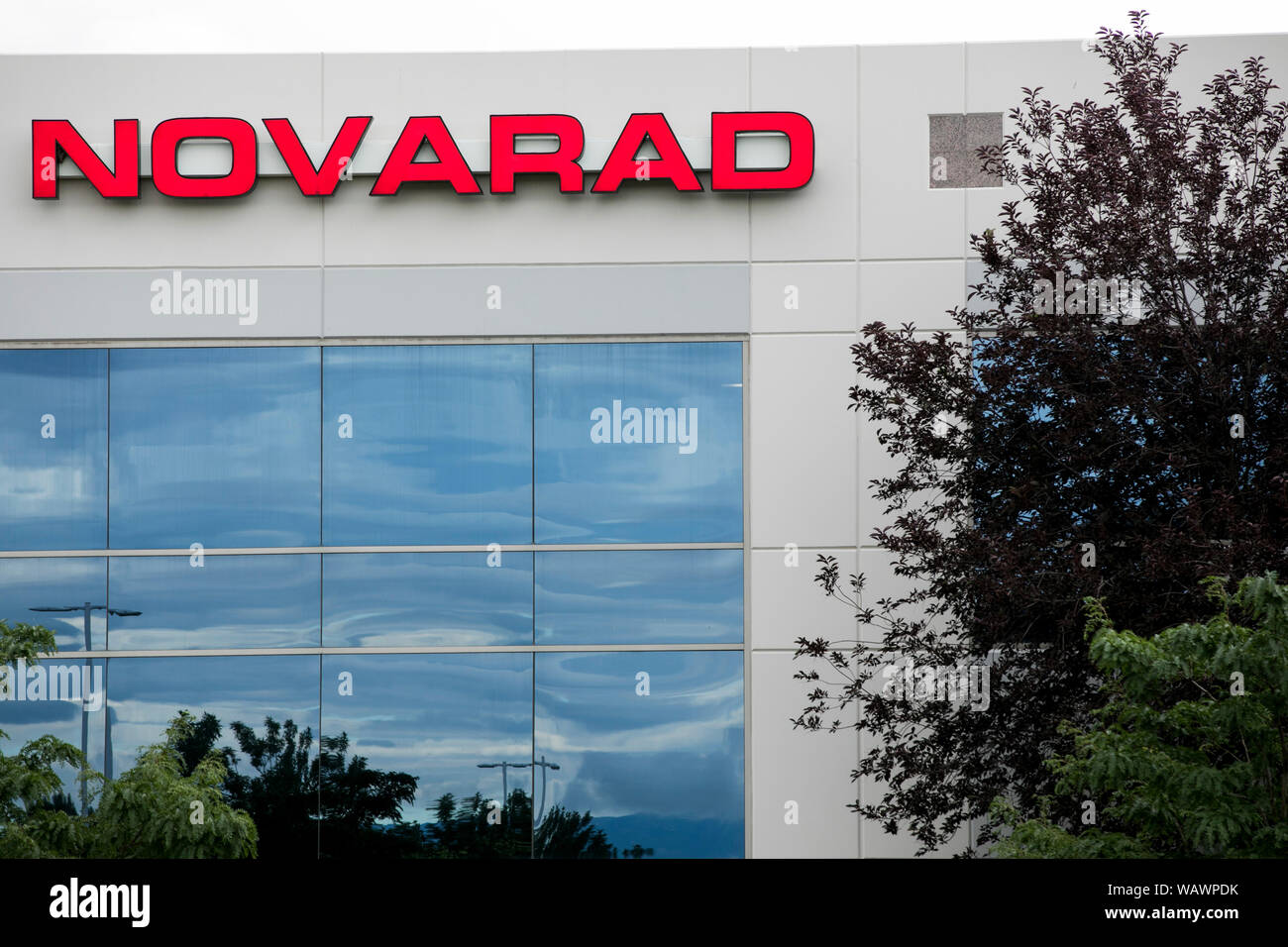 A logo sign outside of the headquarters of Novarad in American Fork ...