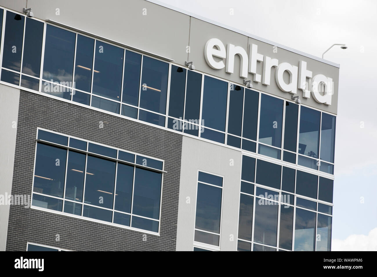 A logo sign outside of the headquarters of Entrata, Inc., in Lehi, Utah on July 27, 2019 Stock ...
