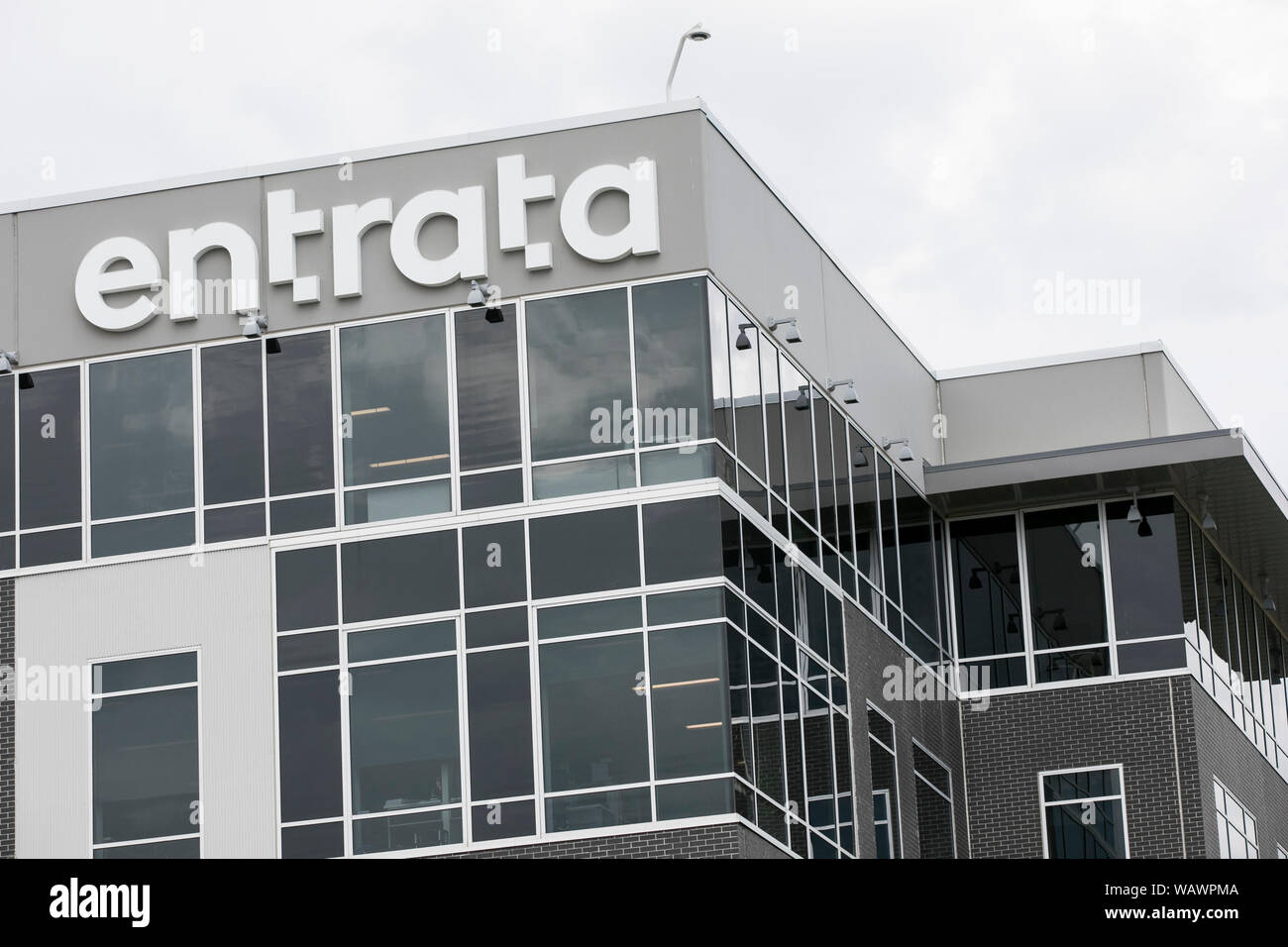 A logo sign outside of the headquarters of Entrata, Inc., in Lehi, Utah on July 27, 2019 Stock ...