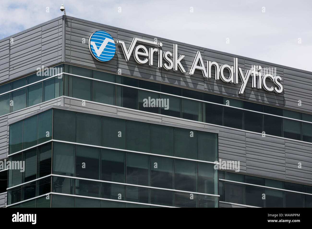 A logo sign outside of the headquarters of Verisk Analytics in Lehi ...