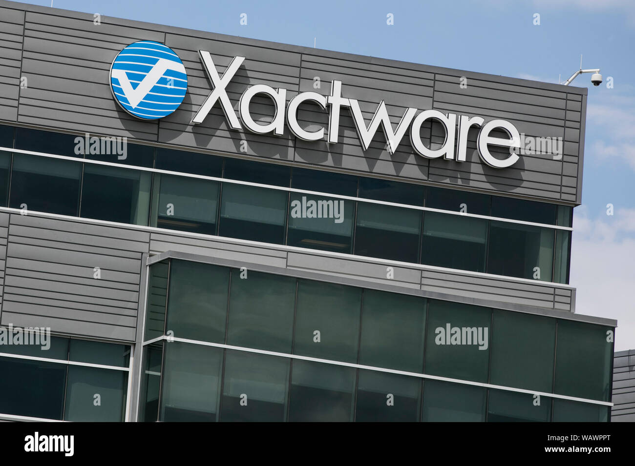A logo sign outside of the headquarters of Xactware in Lehi, Utah on ...