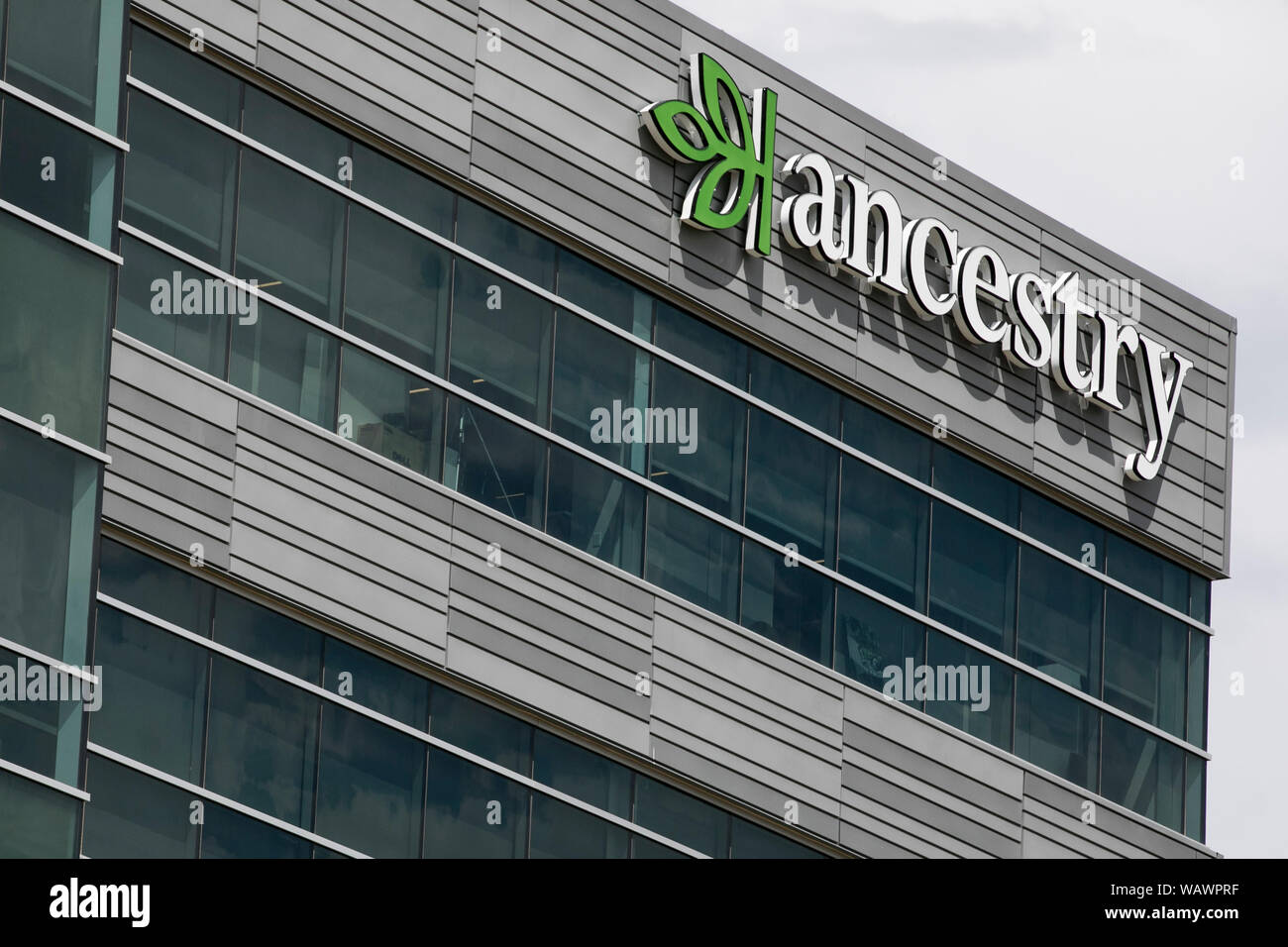 A logo sign outside of the headquarters of Ancestry (Ancestry.com) in ...