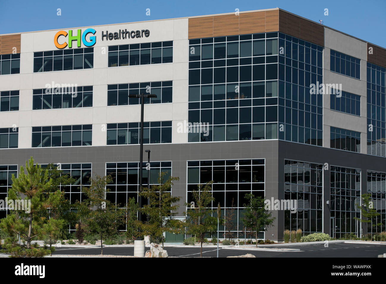 A logo sign outside of the headquarters of CHG Healthcare in Midvale ...