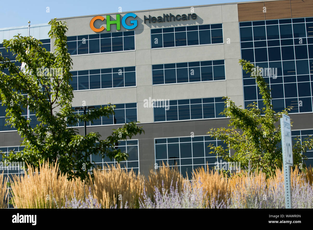 A logo sign outside of the headquarters of CHG Healthcare in Midvale ...