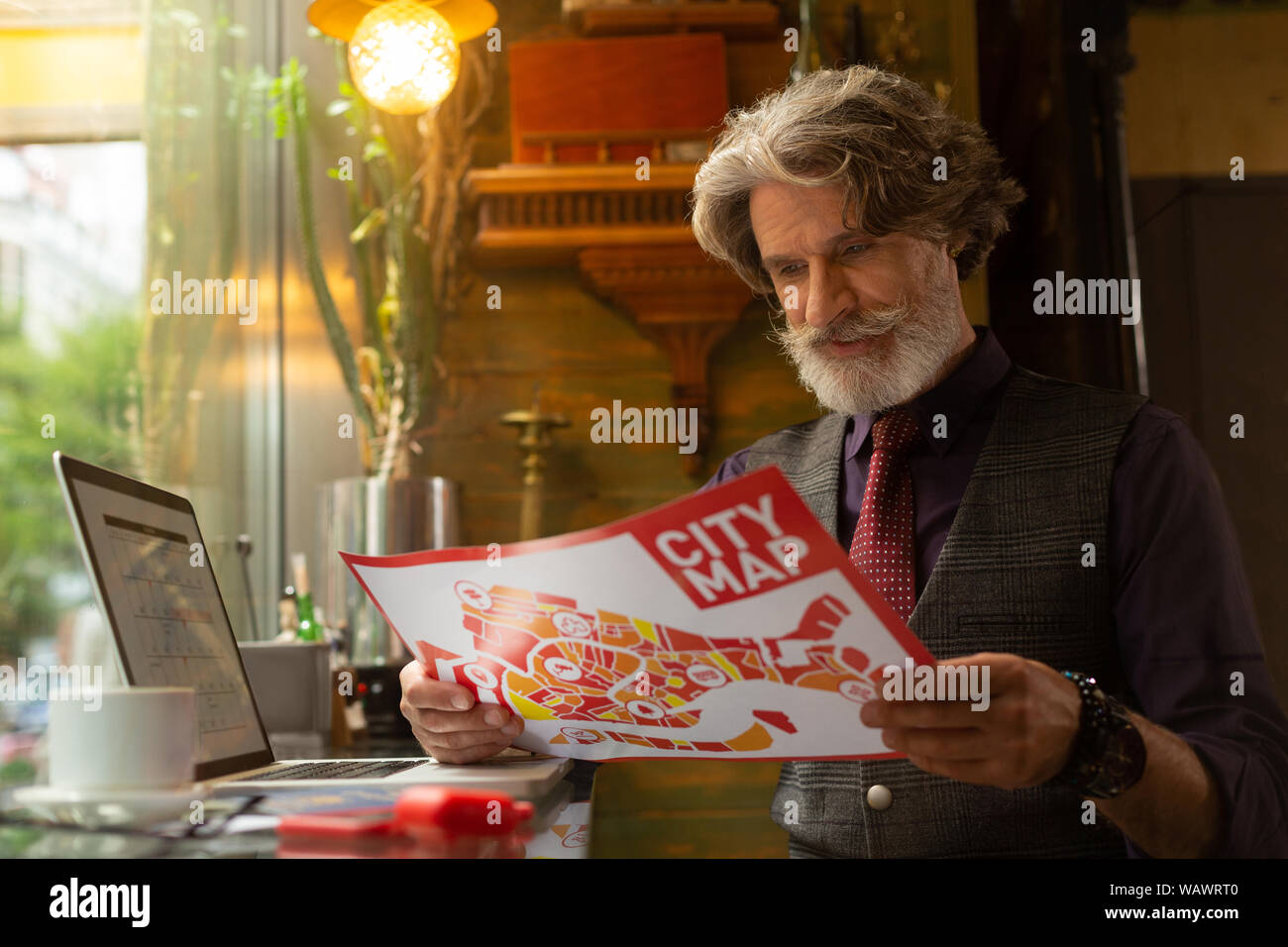 Man getting ready for his walk in new city Stock Photo - Alamy