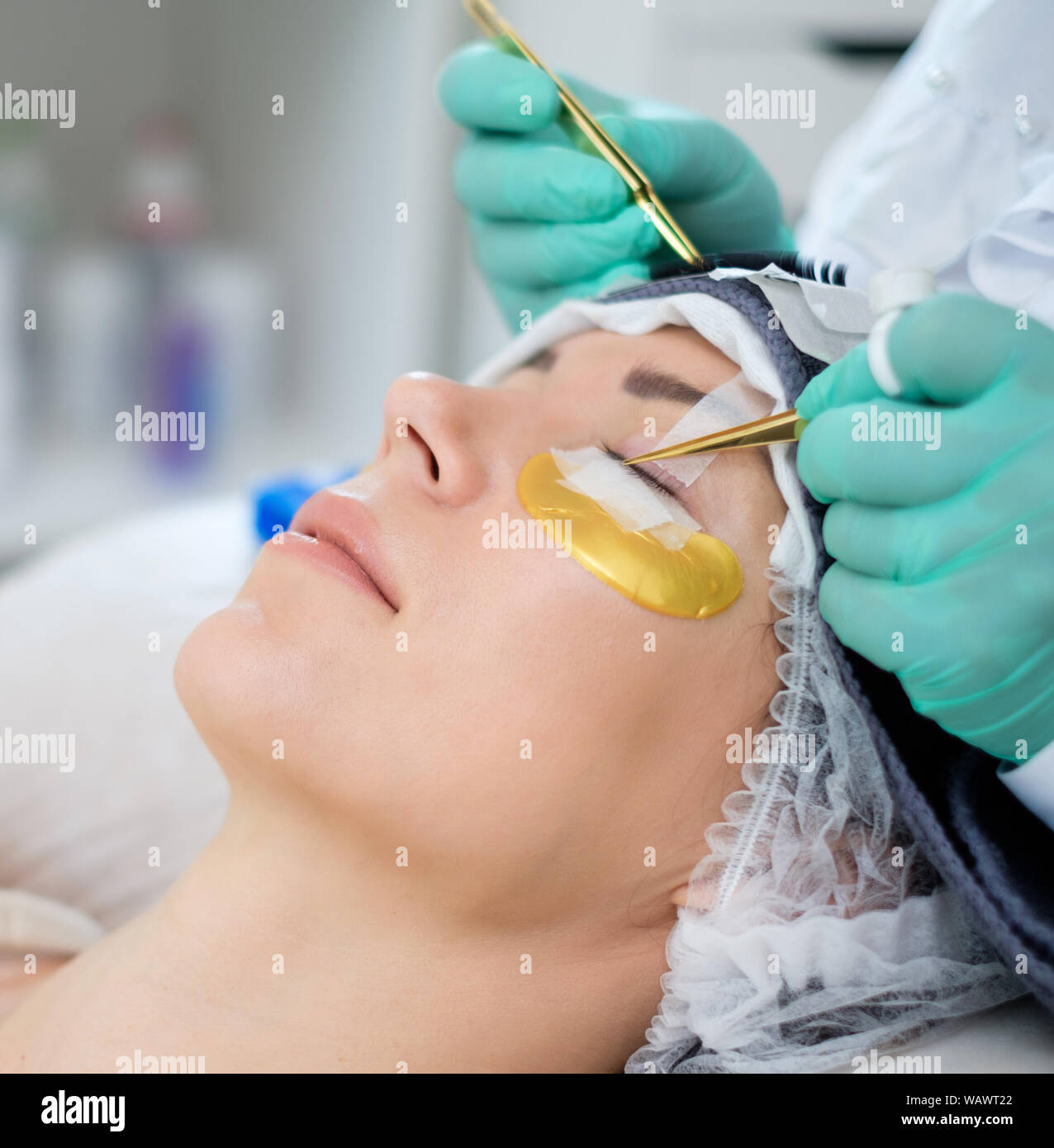 Procedure of eyelashes extension in salon Stock Photo - Alamy