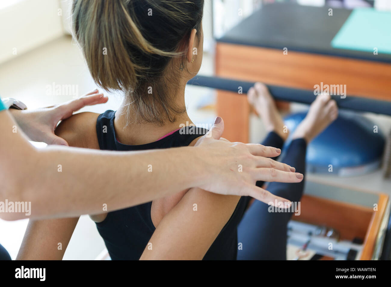 Woman exercise hand to feet hi-res stock photography and images - Alamy