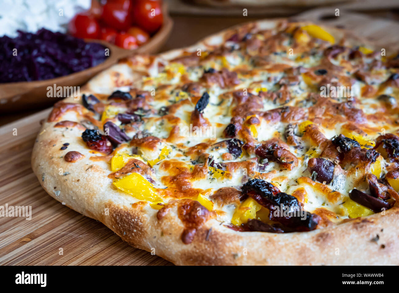 Homemade large pizza extreme closeup Stock Photo - Alamy