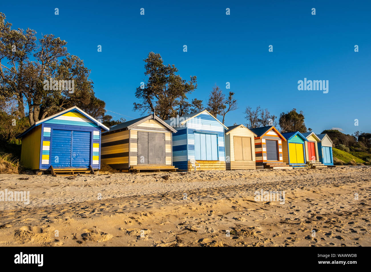 Colorful beach huts on the sand of Dromana coastline in Melbourne ...