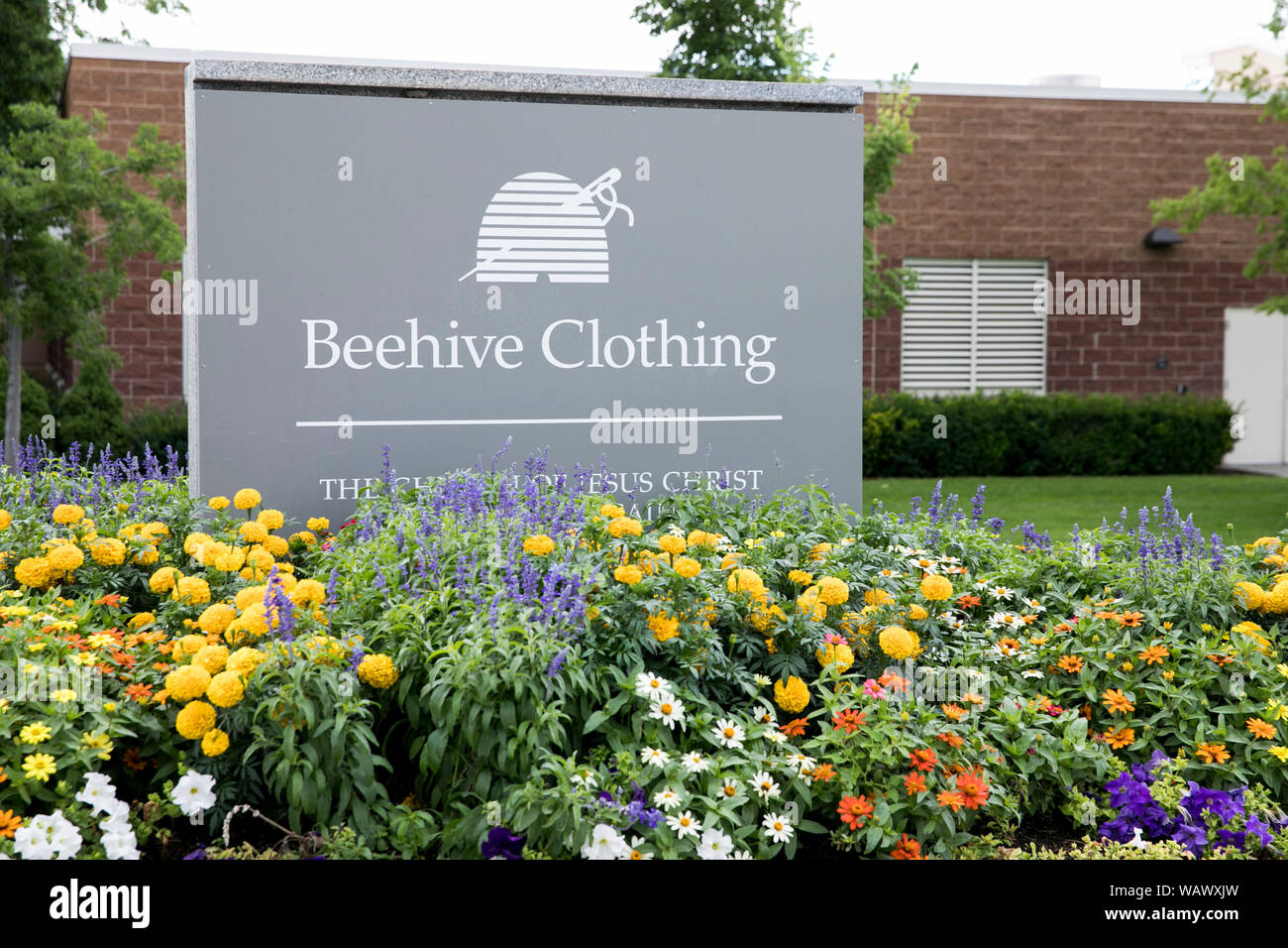 A logo sign outside of a facility occupied by Beehive Clothing in American Fork, Utah on July 27 ...