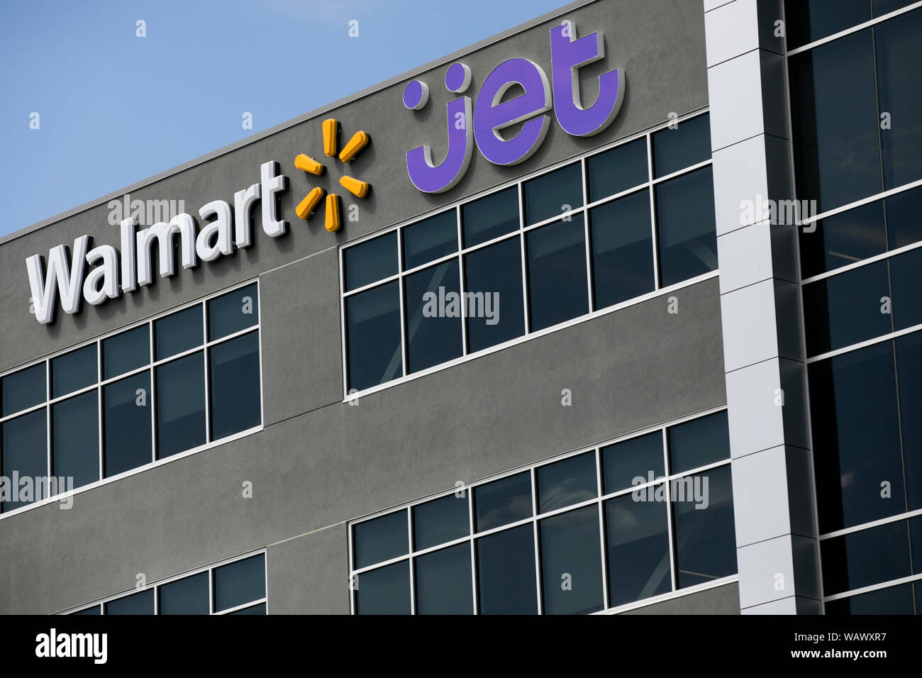 A logo sign outside of a facility occupied by Jet, a subsidiary of ...
