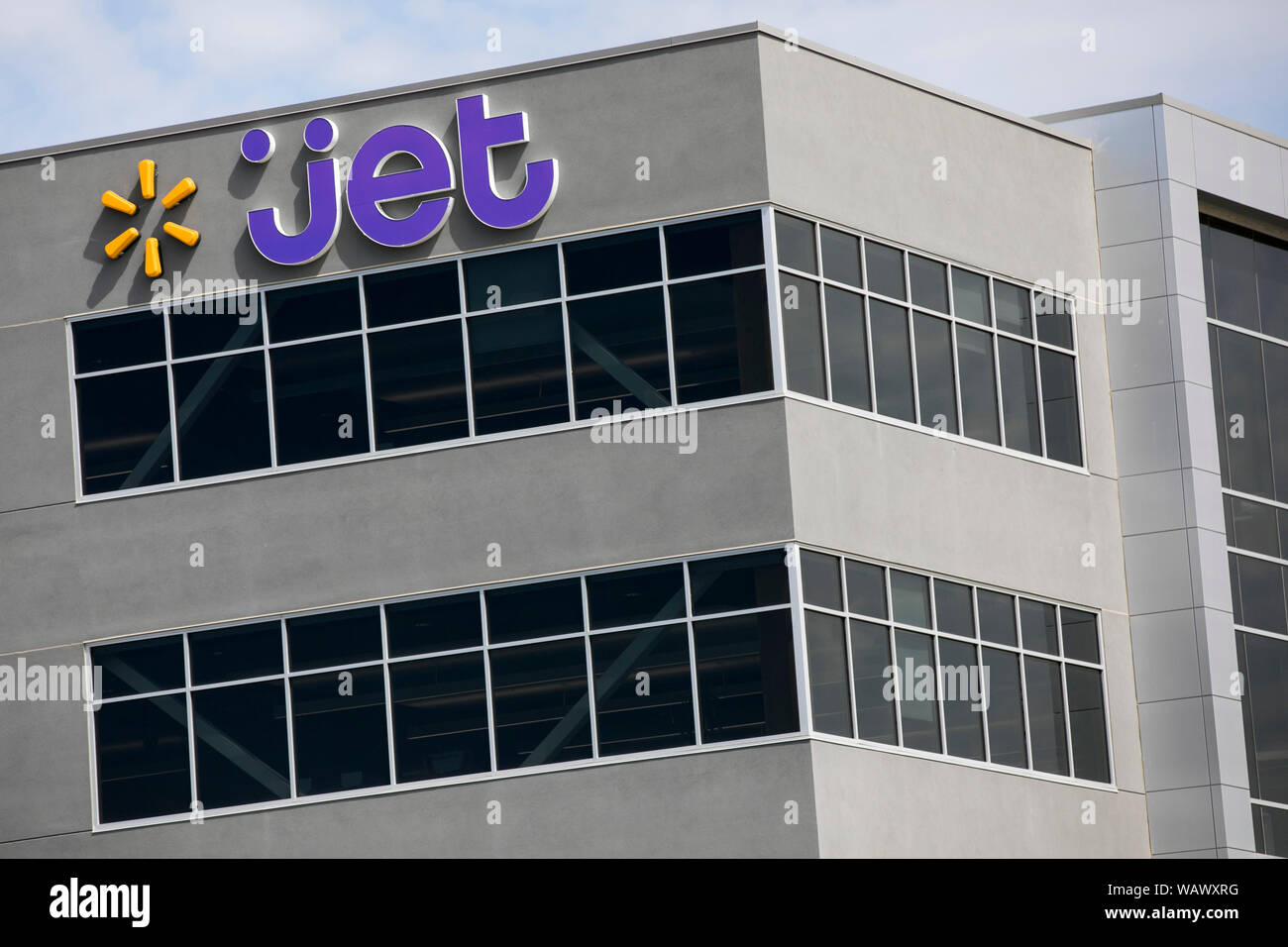 A logo sign outside of a facility occupied by Jet, a subsidiary of ...