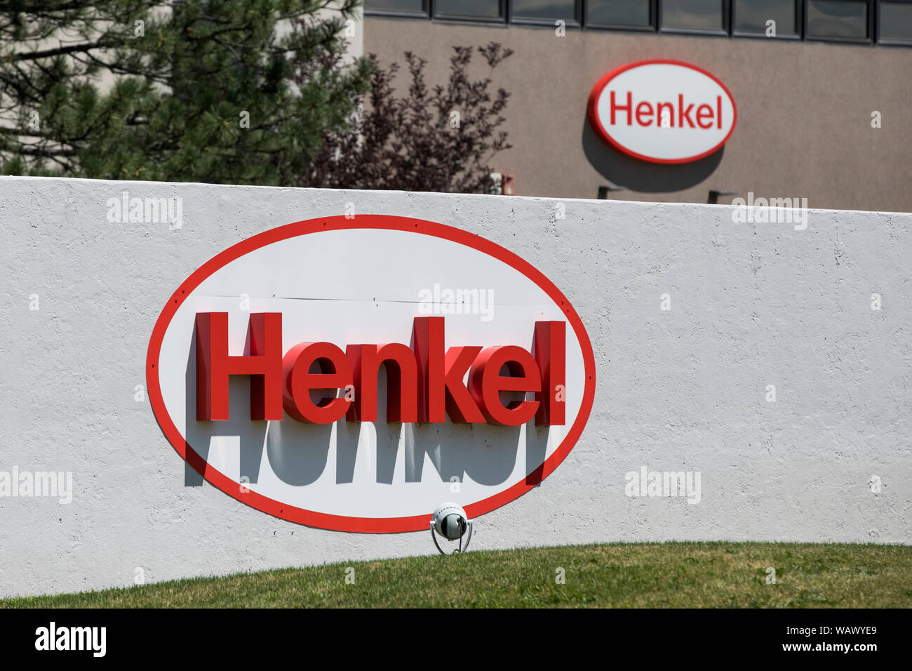 A logo sign outside of a facility occupied by Henkel AG & Company in ...