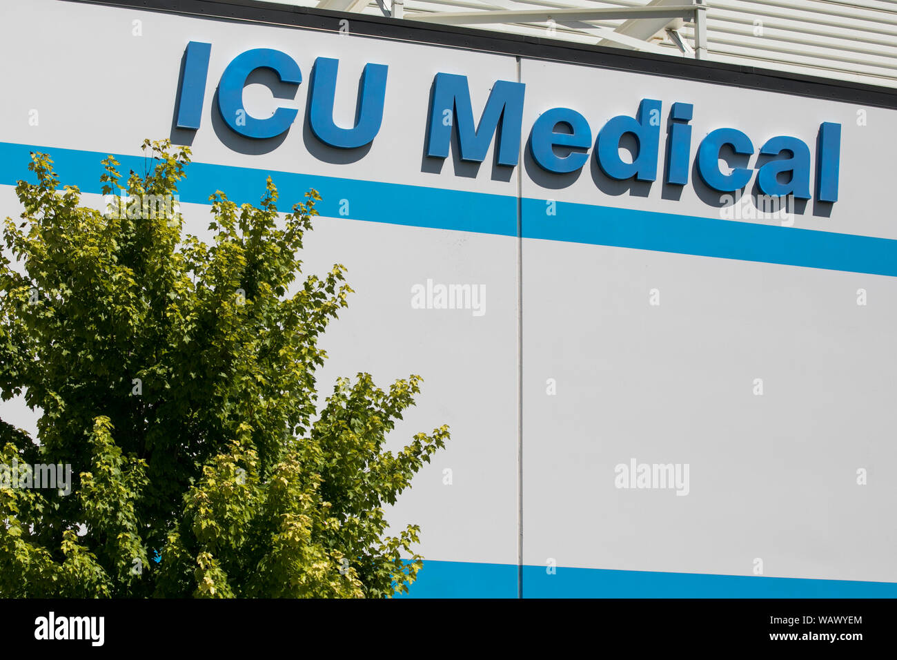 A logo sign outside of a facility occupied by ICU Medical in Salt Lake ...
