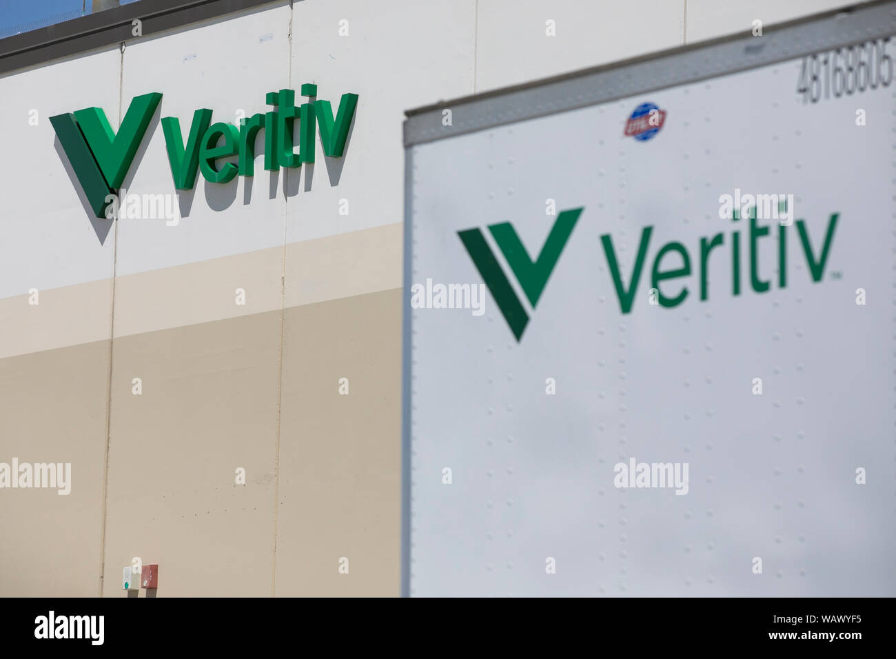 A logo sign outside of a facility occupied by the Veritiv Corporation ...