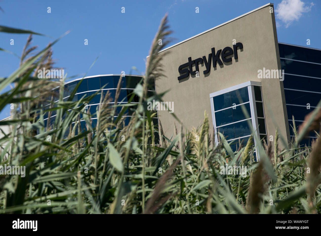 A logo sign outside of a facility occupied by the Stryker Corporation ...