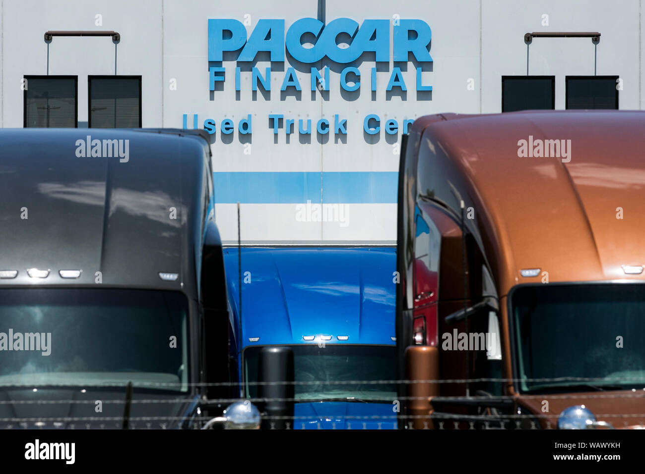 A logo sign outside of a facility occupied by PACCAR Financial in Salt ...