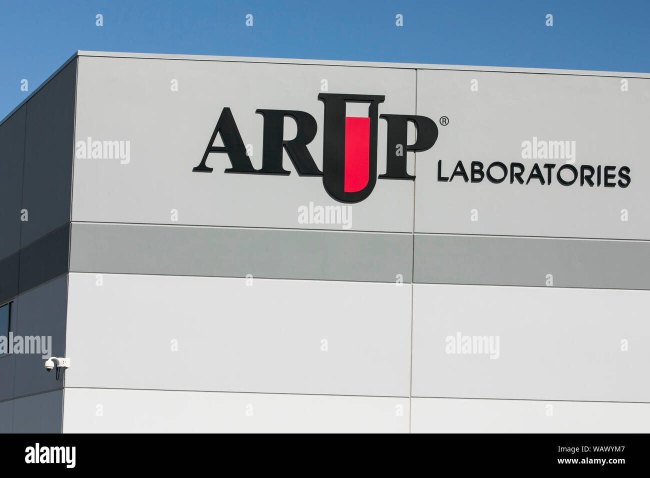 A logo sign outside of a facility occupied by ARUP Laboratories in Salt ...