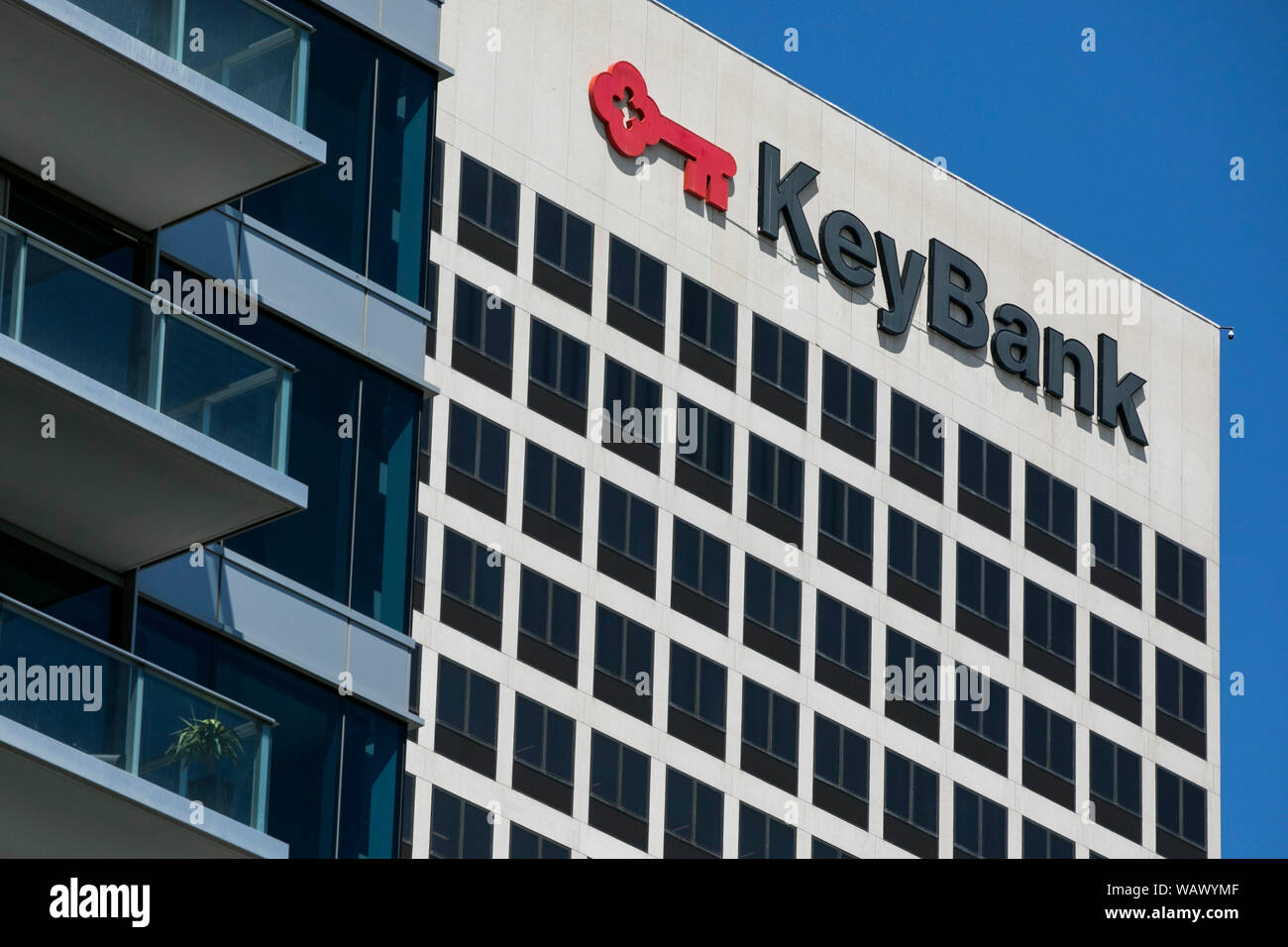 A logo sign outside of a facility occupied by KeyBank in Salt Lake City ...