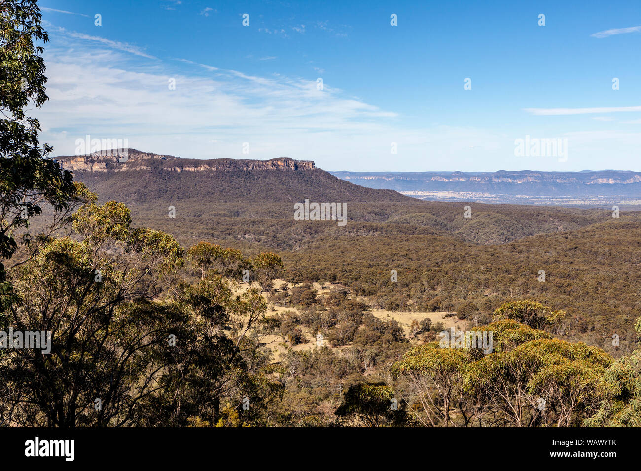 Capertee Valley, surrounded by sandstone ridges and escarpments, in New ...
