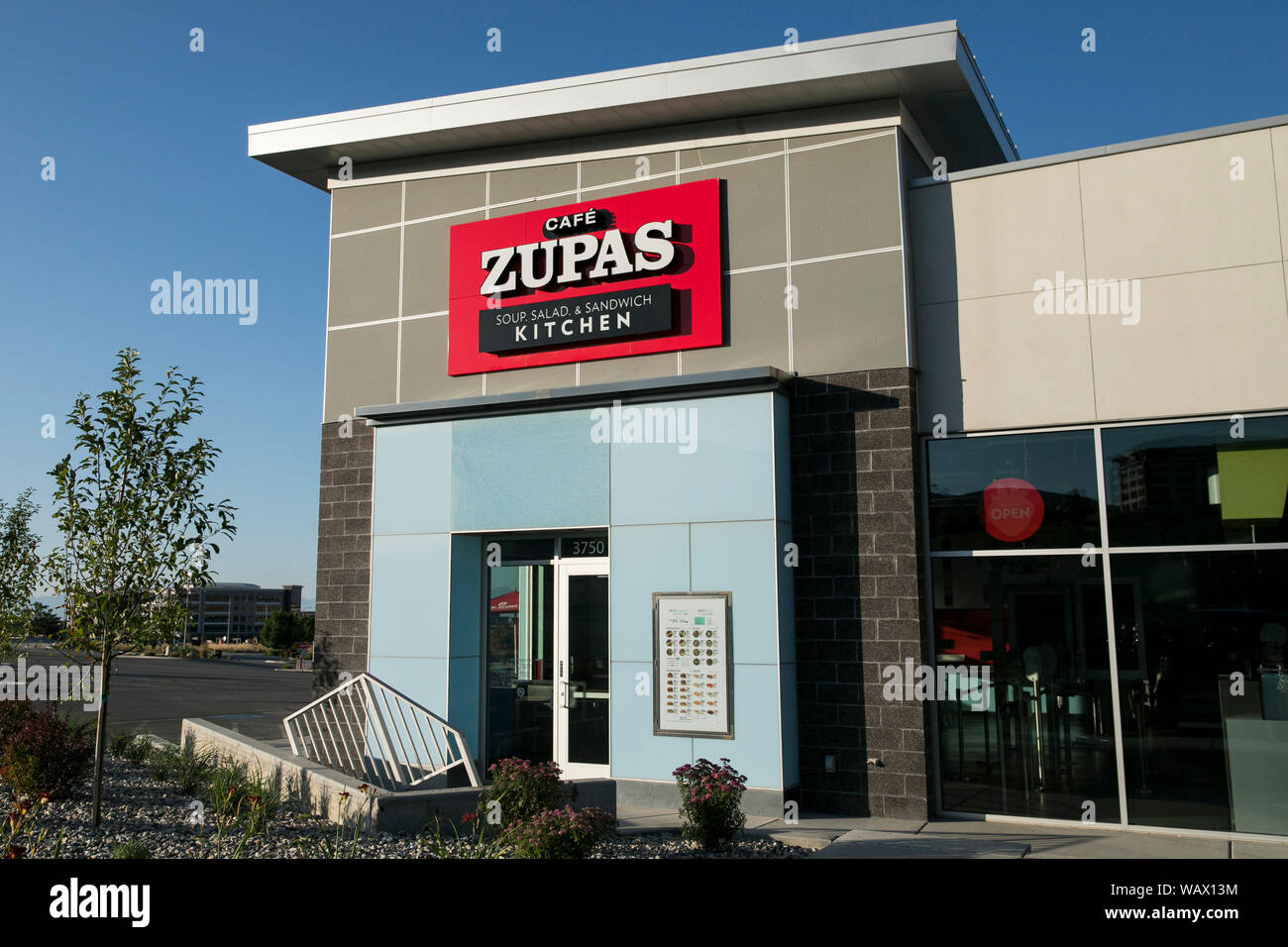 A logo sign outside of a Cafe Zupas restaurant location in Lehi, Utah on July 28, 2019 Stock ...