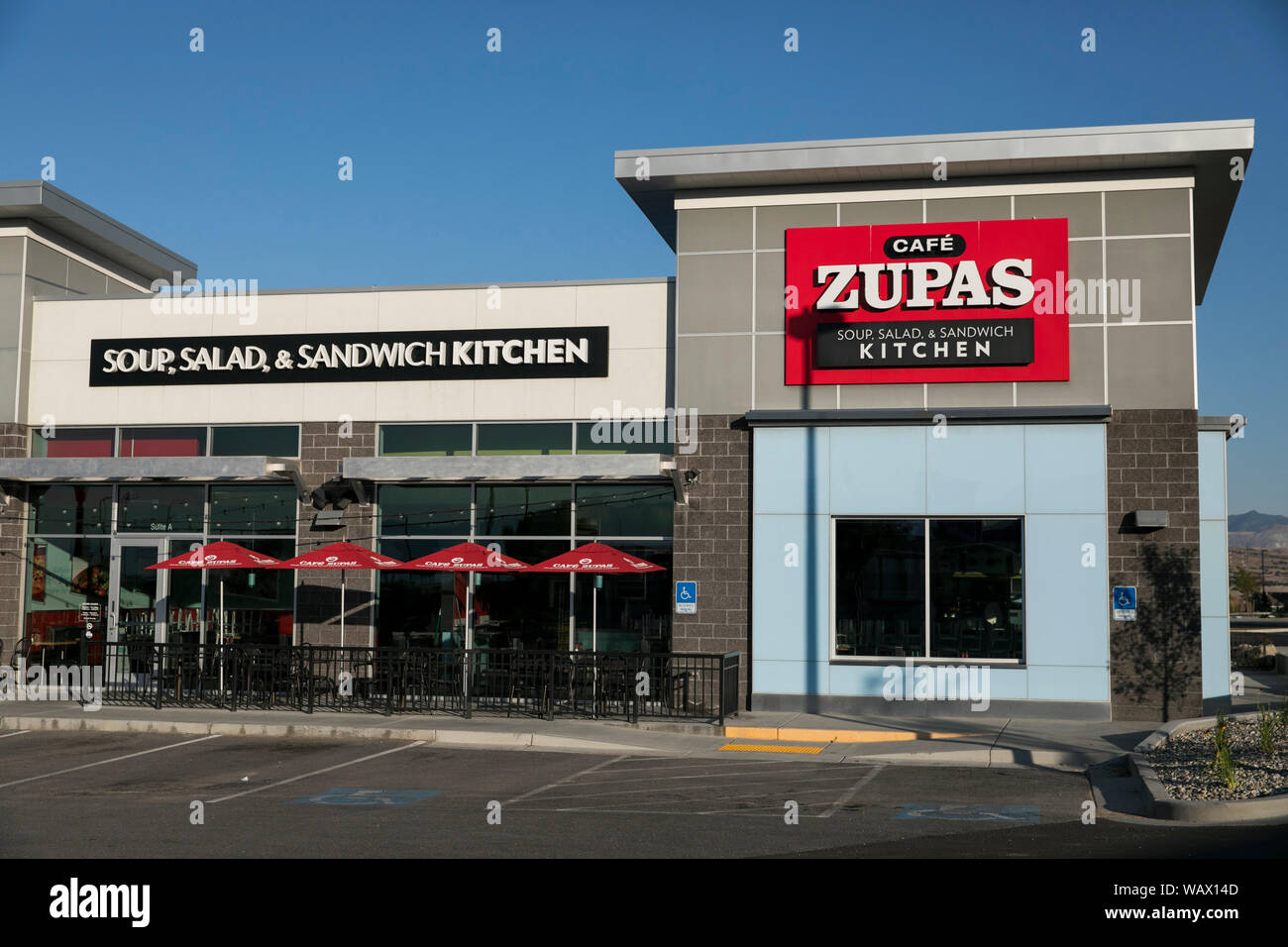 A logo sign outside of a Cafe Zupas restaurant location in Lehi, Utah on July 28, 2019 Stock ...