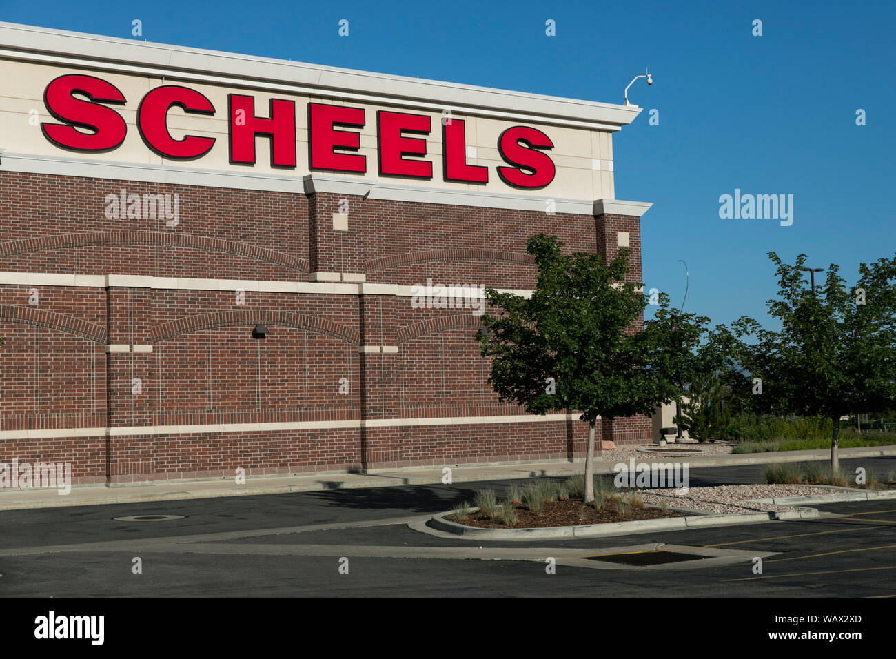 A logo sign outside of a Scheels retail store location in Draper, Utah ...