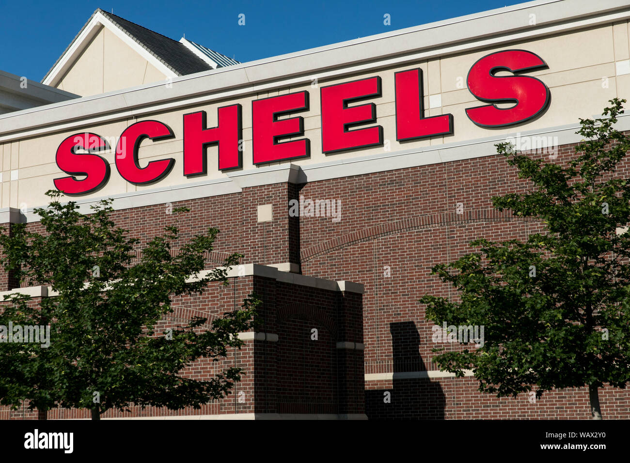 A logo sign outside of a Scheels retail store location in Draper, Utah ...